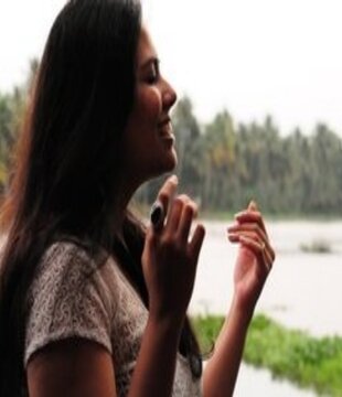 Malayalam Singer Rashmi Vijayan Biography, News, Photos, Videos | NETTV4U